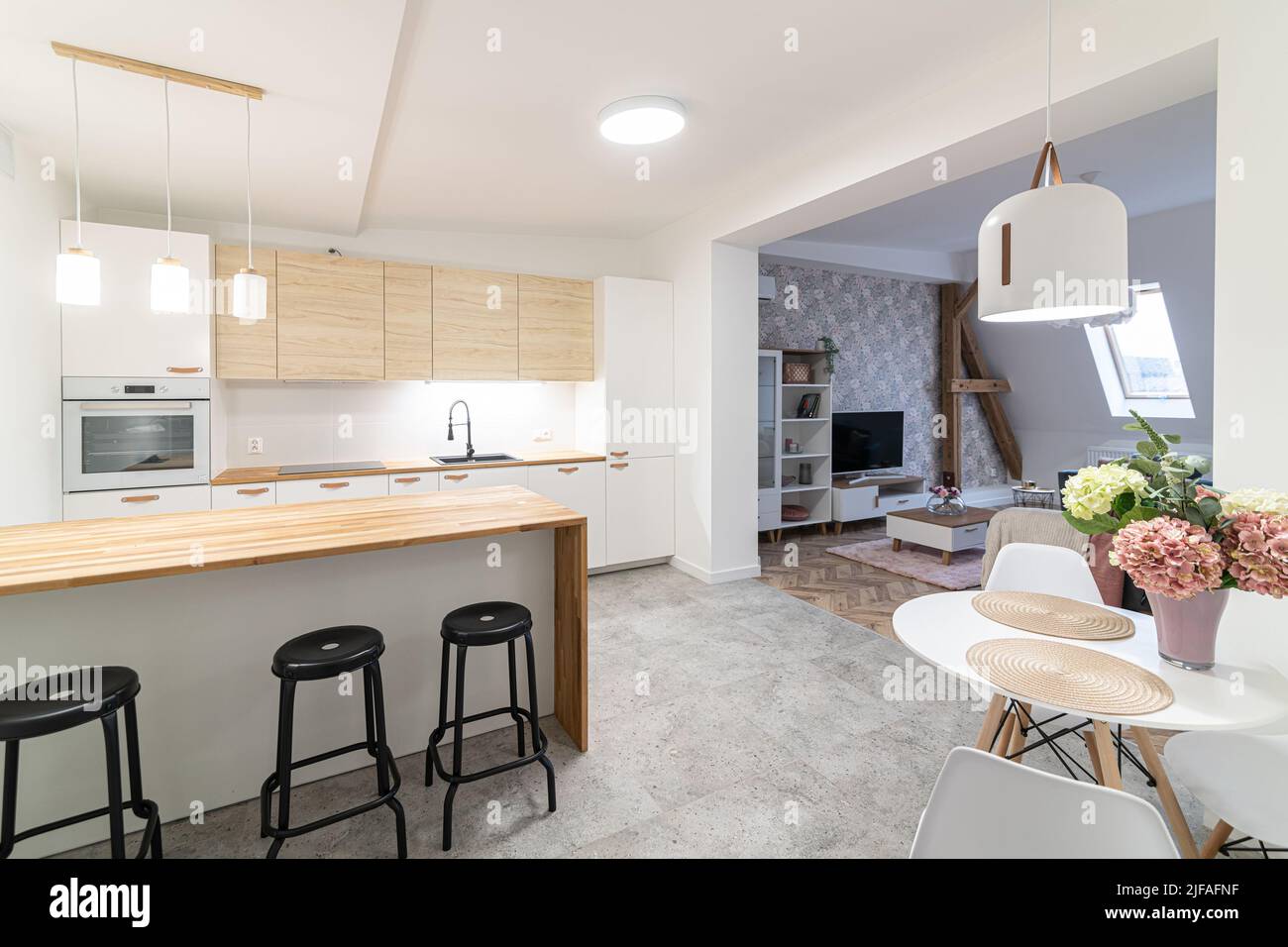 Modern apartment kitchen with a counte Stock Photo - Alamy