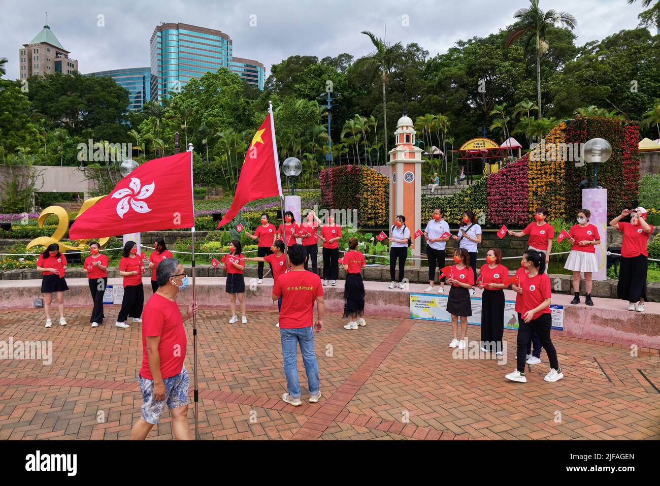 Hong Kong, China. 01st July, 2022. People take photos with Chinese and ...