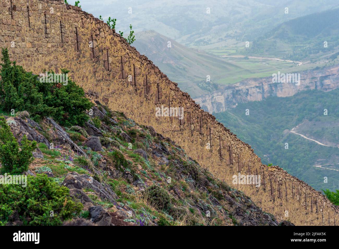 medieval fortress wall on a mountain slope, Gunib (Shamil) fortress in ...