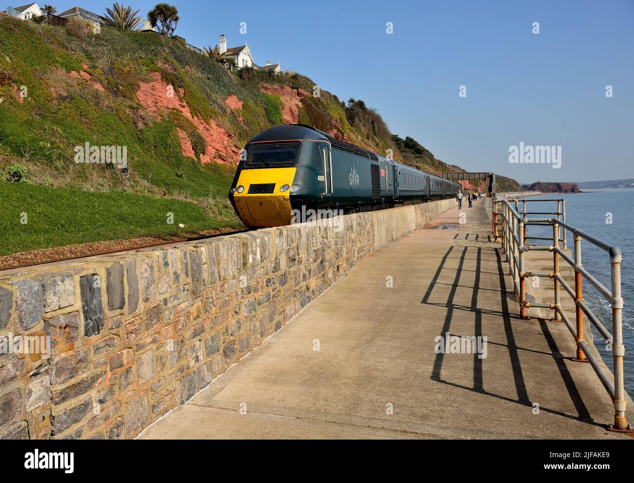 An Intercity125 high speed train passing along the seawall at Dawlish ...
