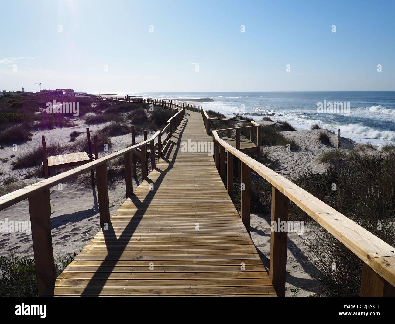 Wooden sidewalk on the beach next to ocean, Portugal Stock Photo - Alamy