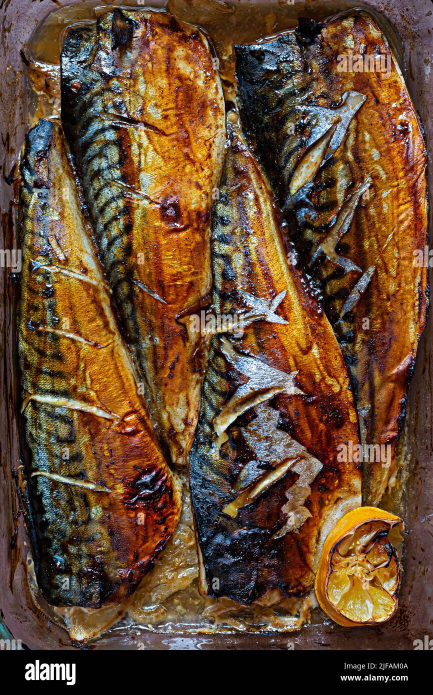 Baked mackerel fillet in teriyaki sauce with lemon. Healthy fish dish ...