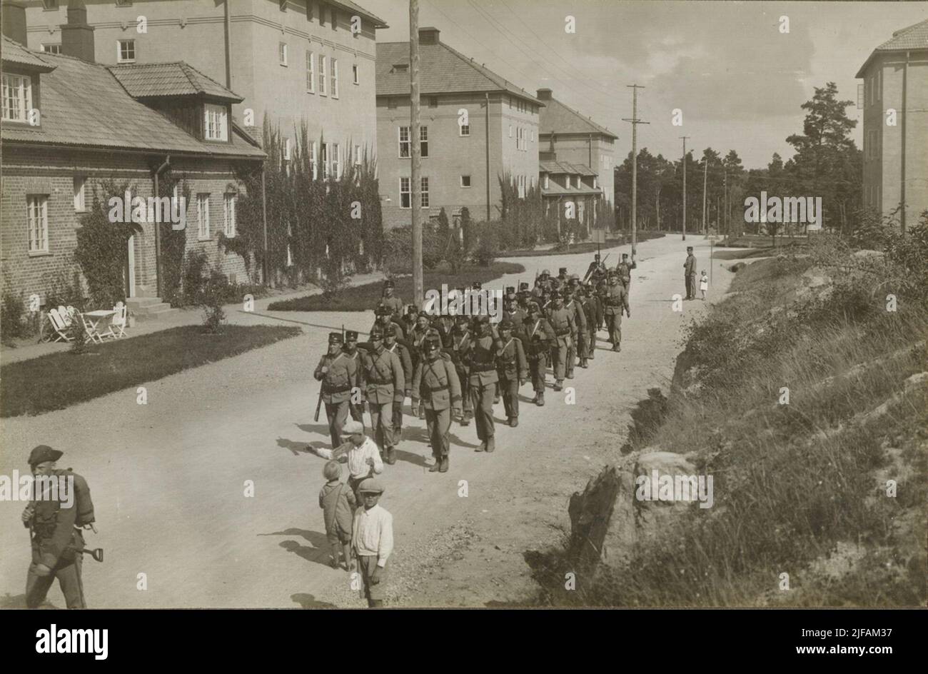 Soldiers from Södermanland's regiment march through Kaserngården. Four ...