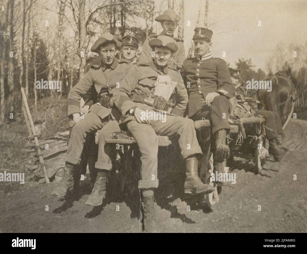 Troop move with soldiers on horse -drawn carriage Stock Photo - Alamy
