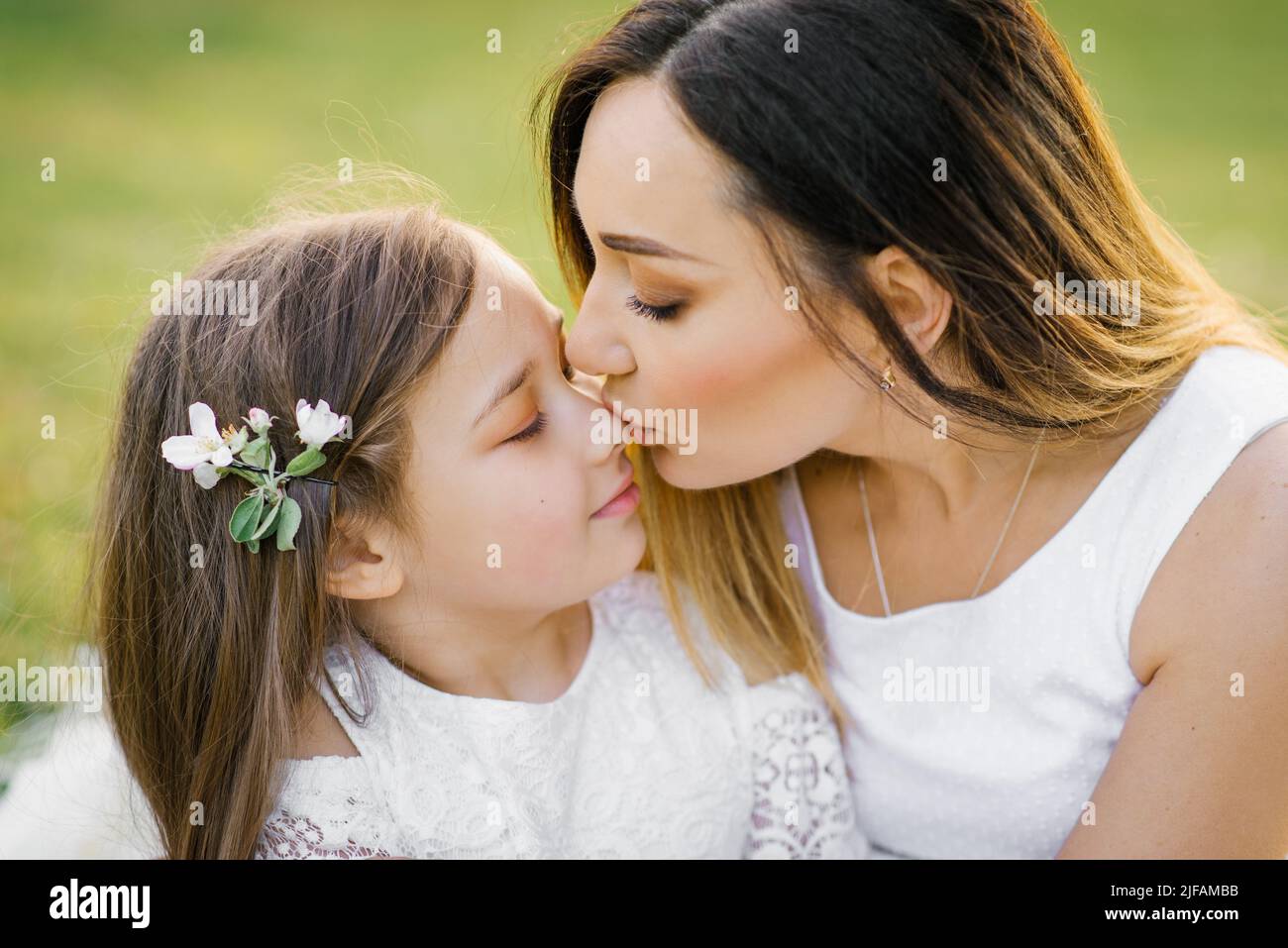 Daughter kissing mother on mothers day hi-res stock photography and images - Alamy