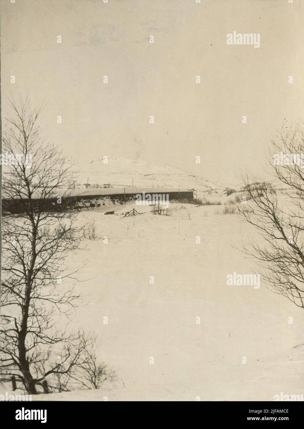 An oblong building in a mountain environment Stock Photo - Alamy