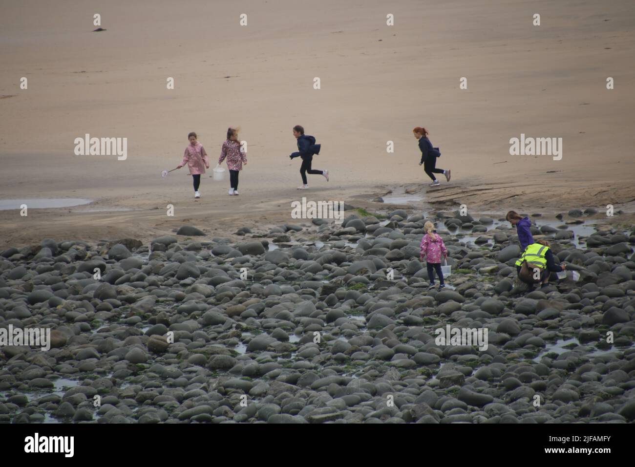 Rock pooling family hi-res stock photography and images - Alamy