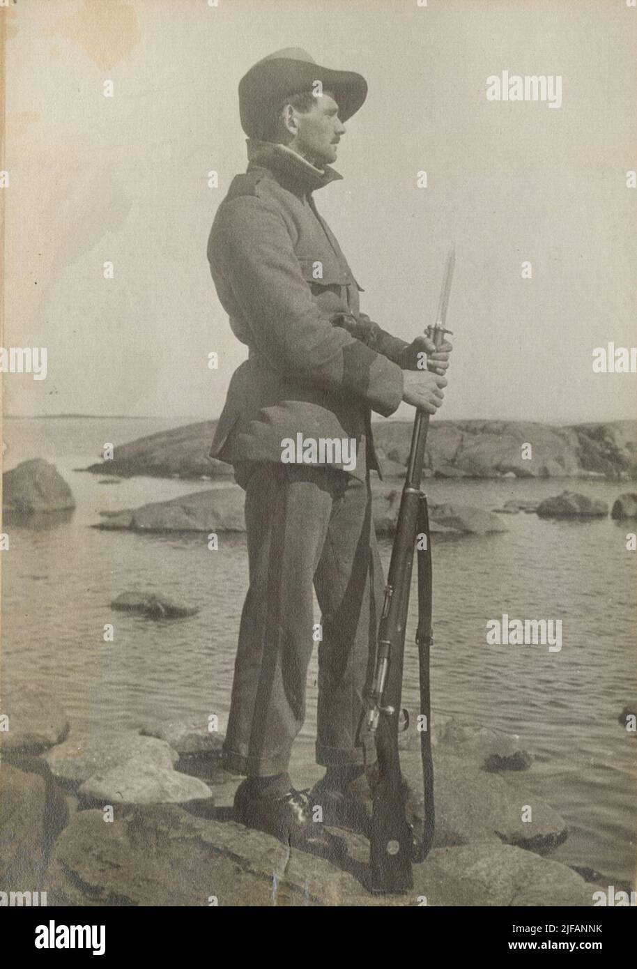Portrait of a soldier standing on the beach Stock Photo - Alamy