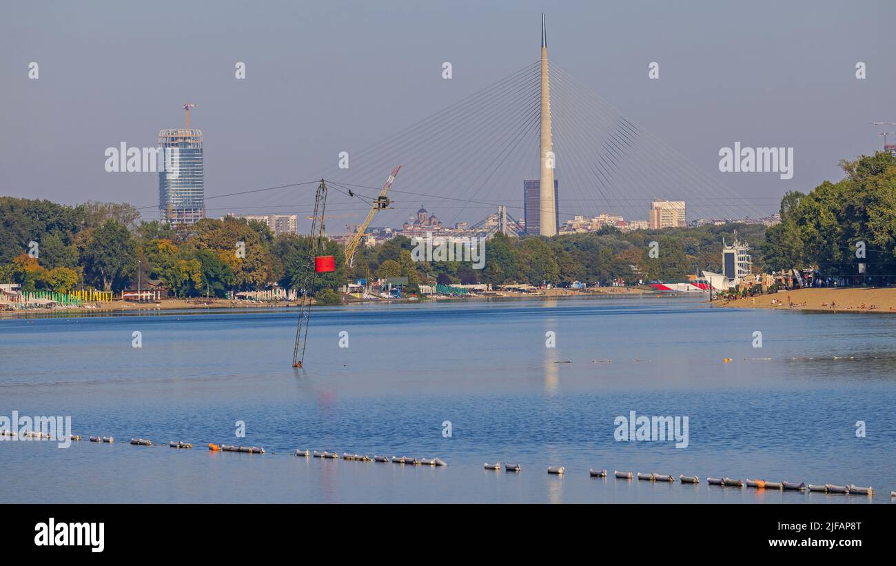 Ada Recreational Lake and Pylon Suspension Bridge at Sunny Autumn Day ...