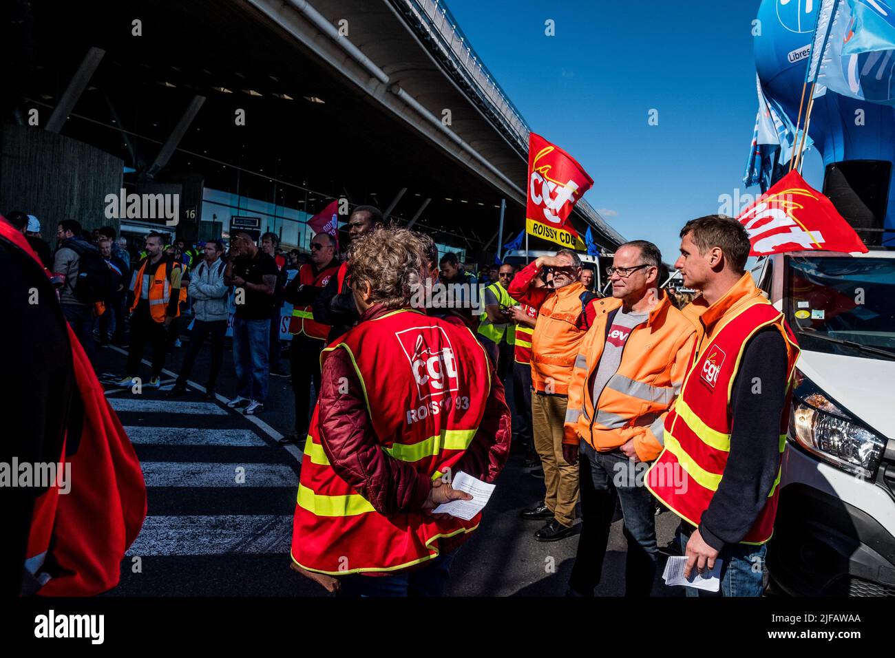 Roissy, France. 01st July, 2022. Airport employees gather outside a ...
