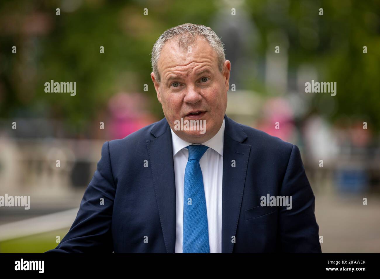 Minister of State for Northern Ireland Conor Burns speaks to the media ...