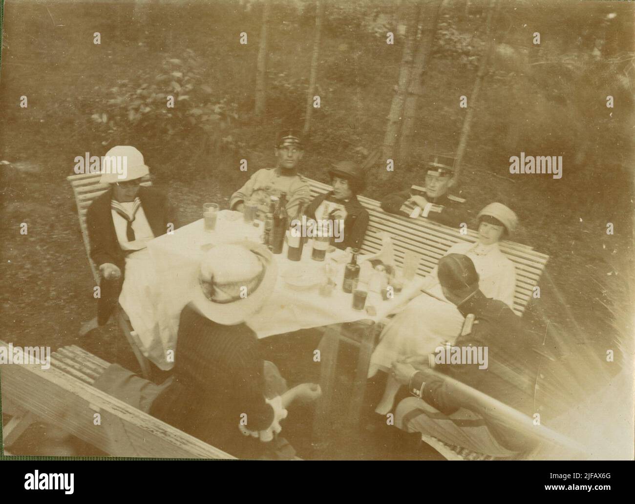 Society enjoy refreshments in the garden Stock Photo - Alamy