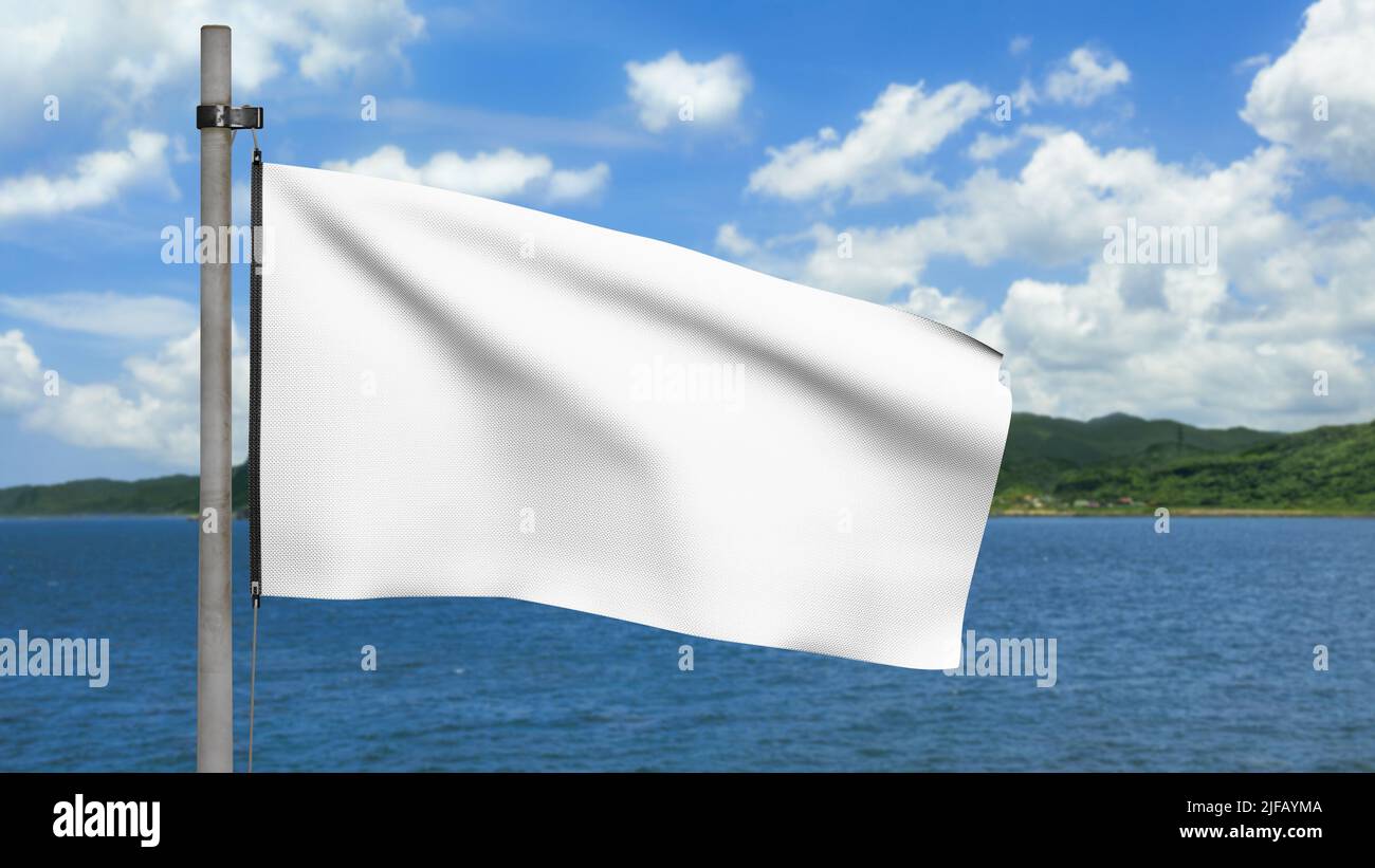 White flag mockup for you design with ocean and blue sky at tropical ...