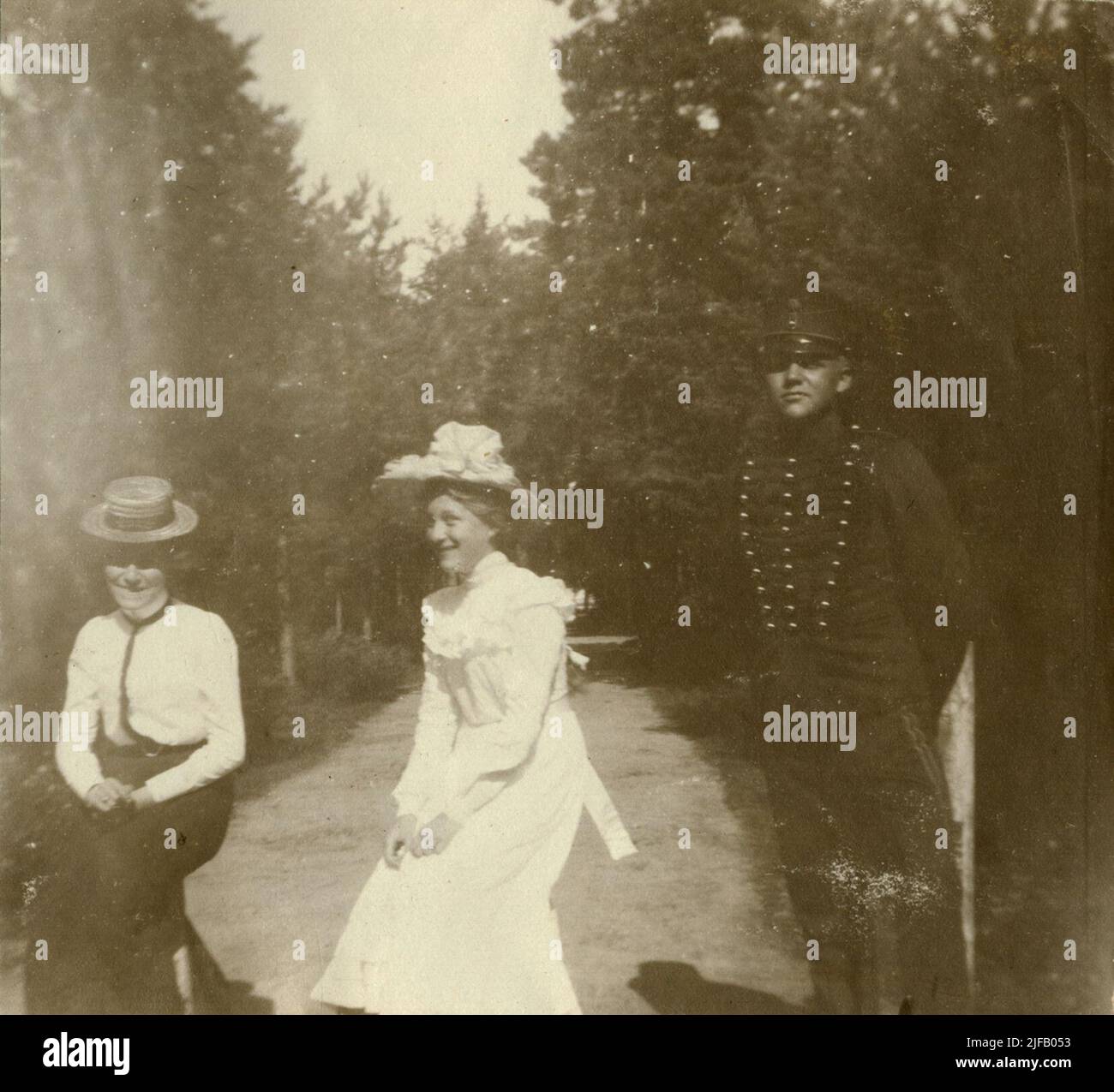 Portrait of two women and one soldier Stock Photo - Alamy