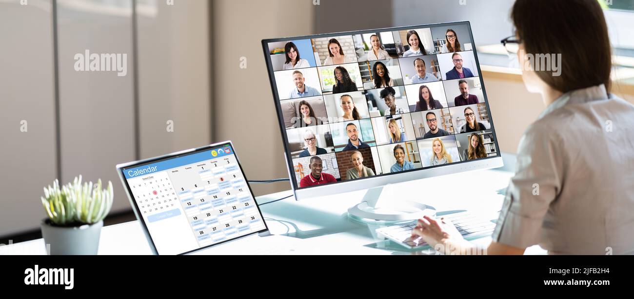 Remote Video Webinar On Desktop PC Computer Stock Photo - Alamy