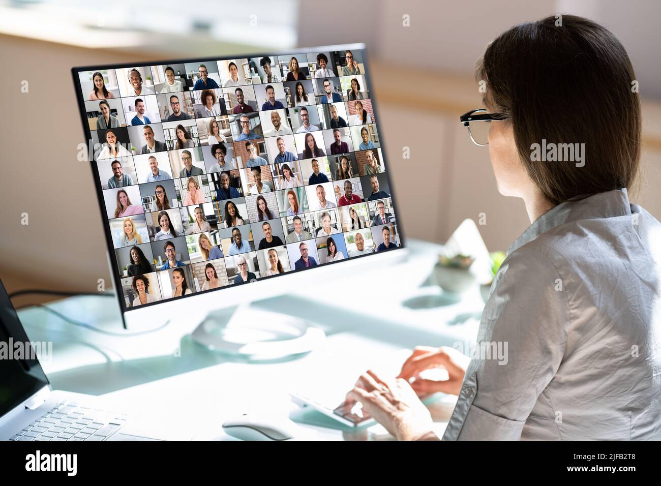 Virtual Video Conference Business Meeting On Computer Stock Photo - Alamy