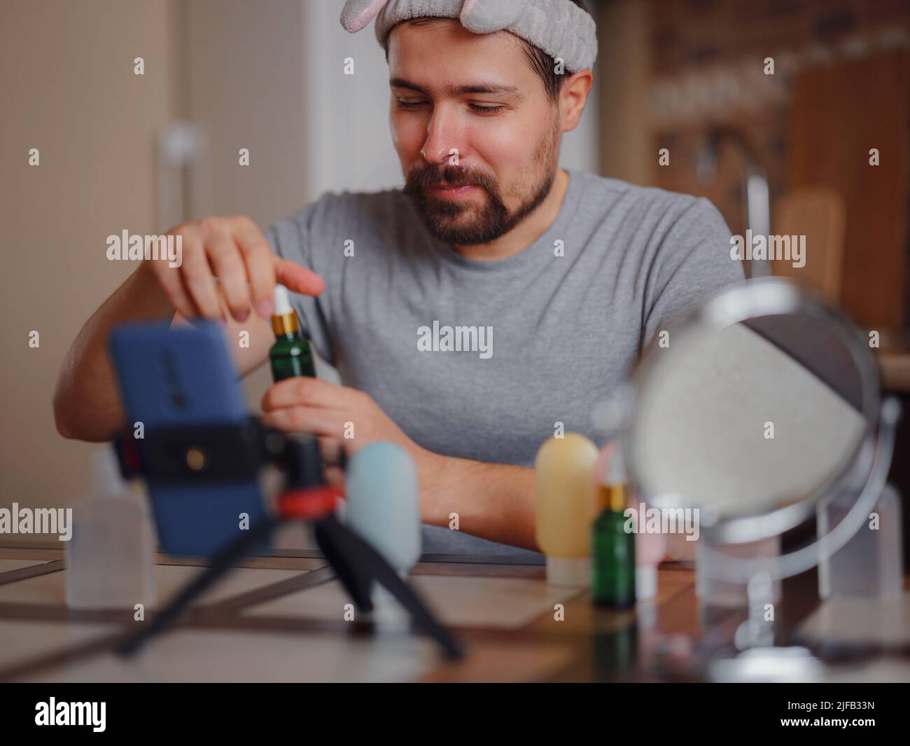 Men's beauty concept. caucAsian guy checking his skin. Beauty blogger ...