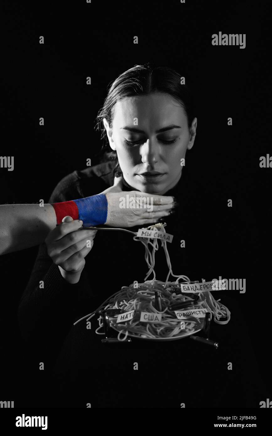 Russian propaganda. Hung spaghetti on the ears. Strangle a woman in war ...