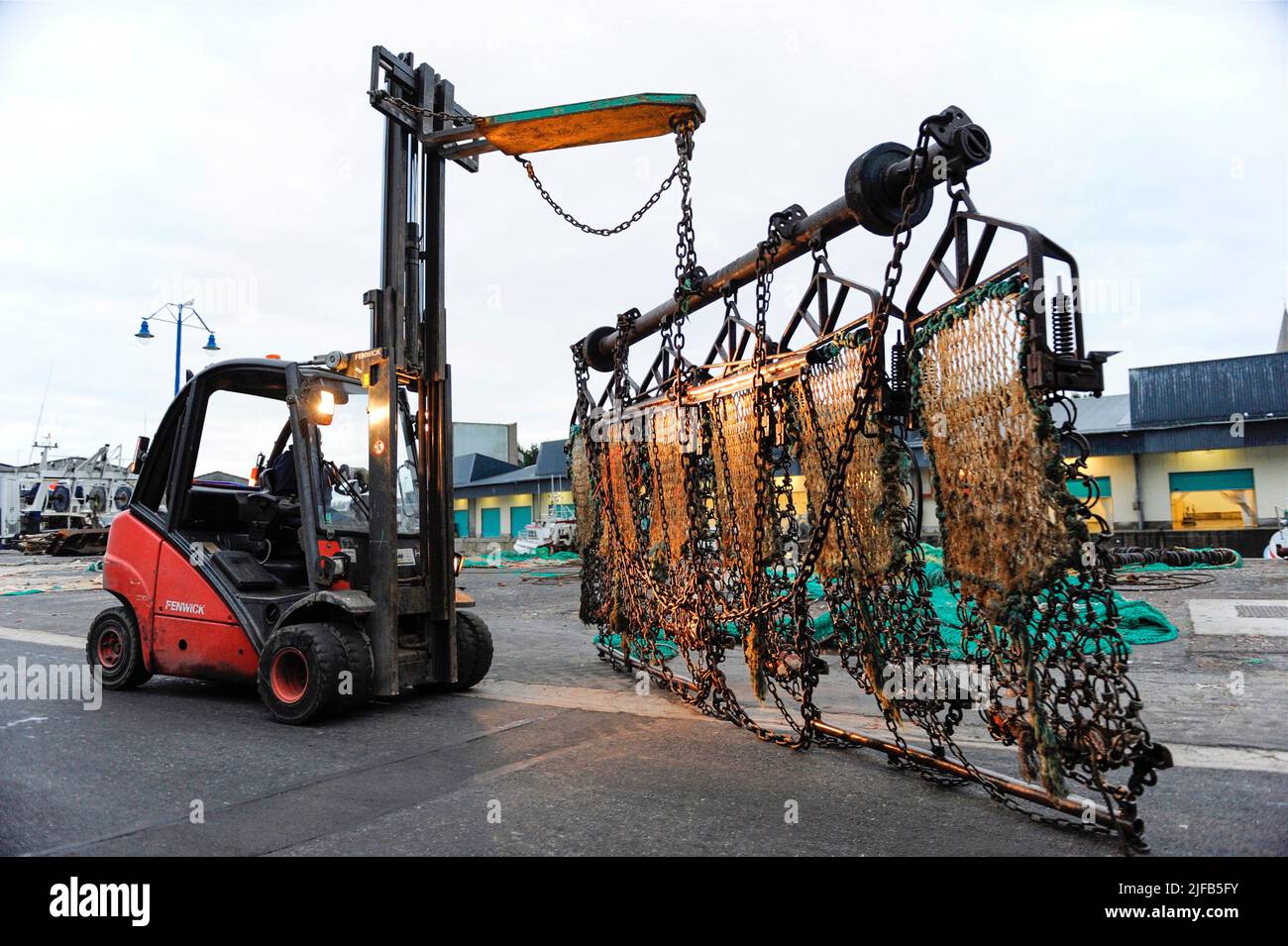 France, Calvados, preparation of a trawler dredge for scallop fishing ...