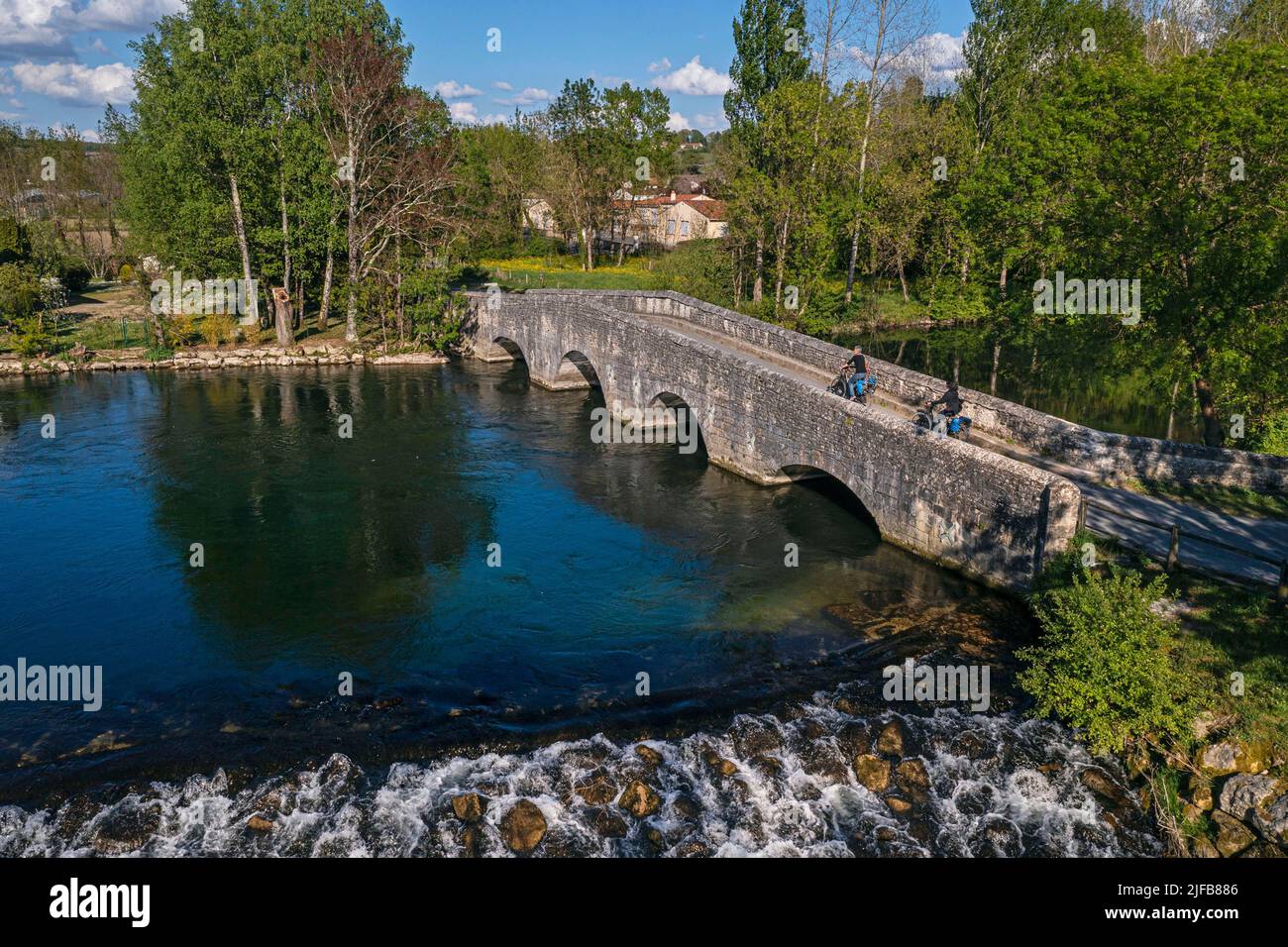 France, Charente, Vibrac, the medieval elbow bridge that crosses the ...