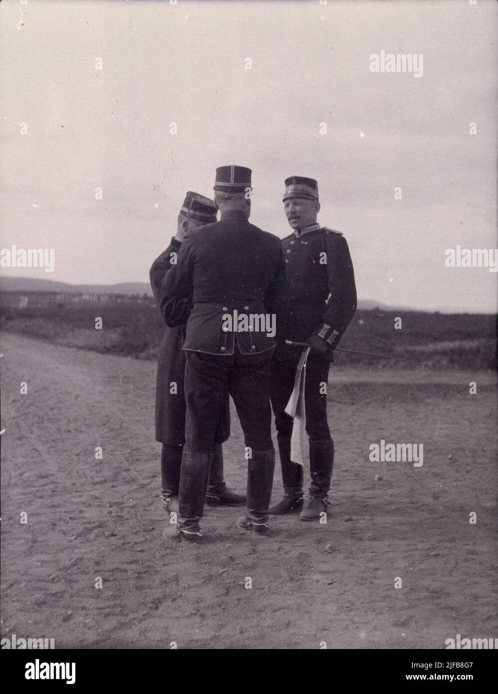 Three soldiers in a meeting Stock Photo - Alamy