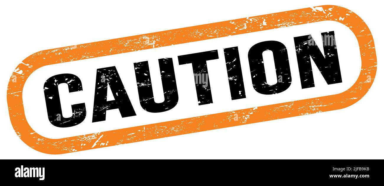 CAUTION, text on orange-black rectangle stamp sign Stock Photo - Alamy