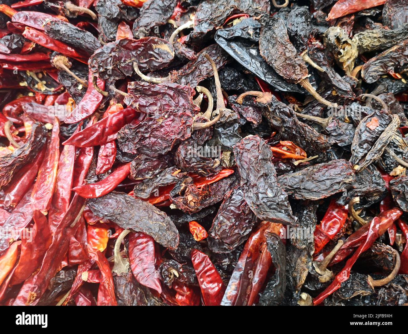 dried chili on the market Stock Photo - Alamy
