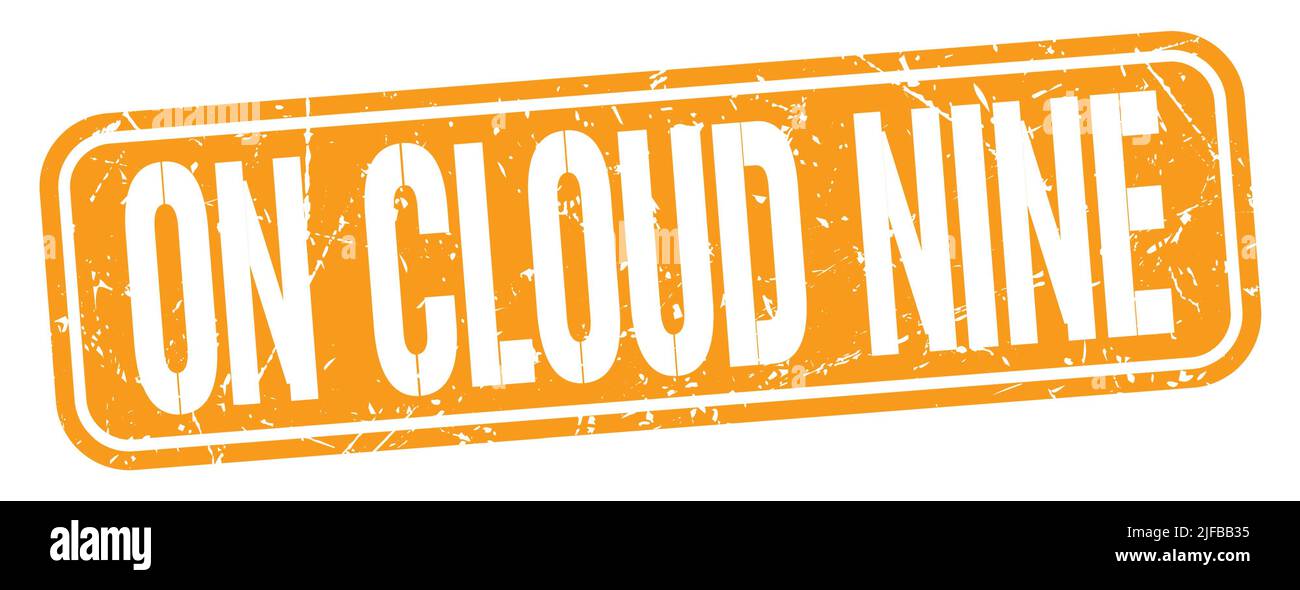 ON CLOUD NINE text written on orange grungy stamp sign Stock Photo - Alamy