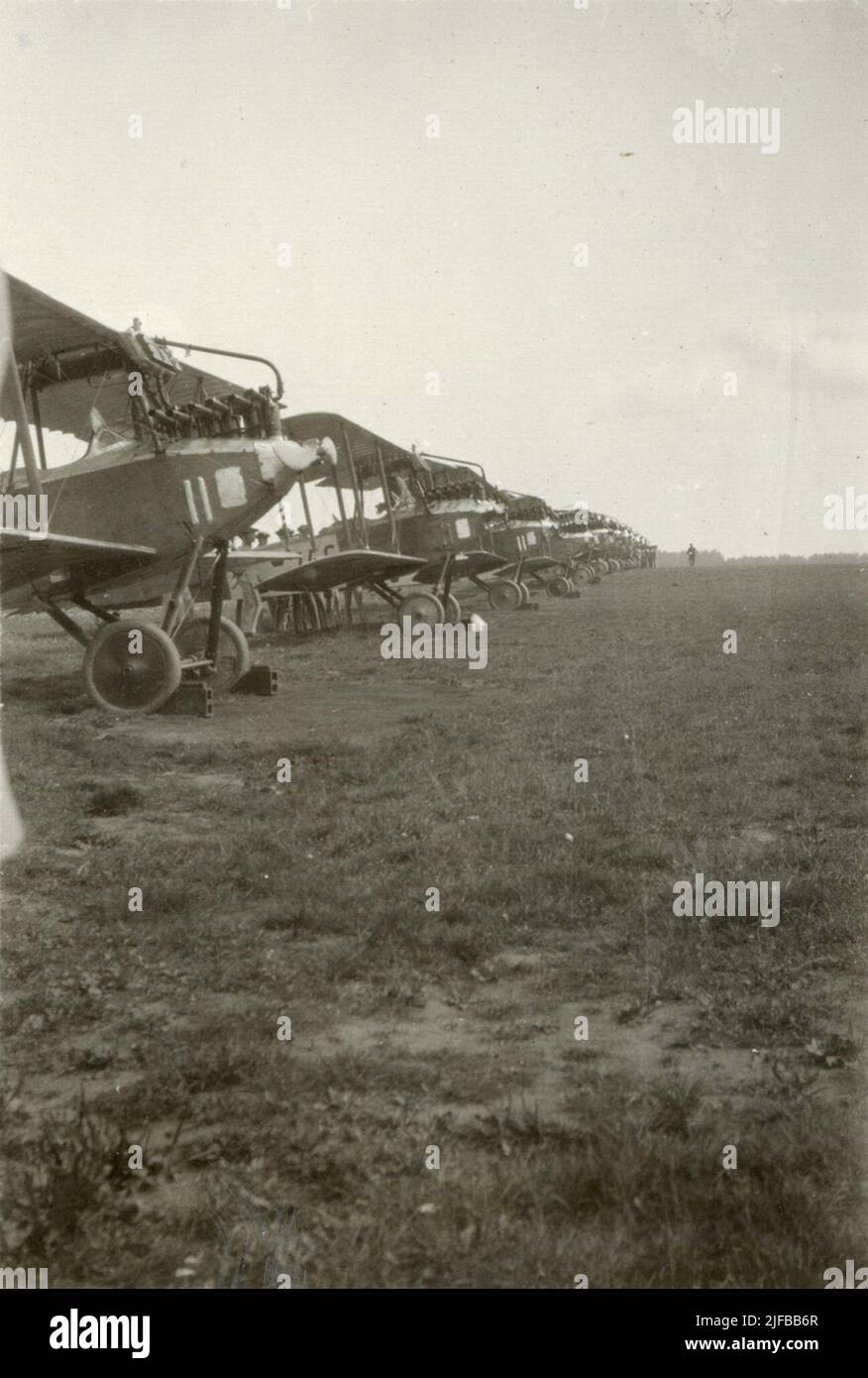 Aircraft set up in a row on airfields Stock Photo - Alamy