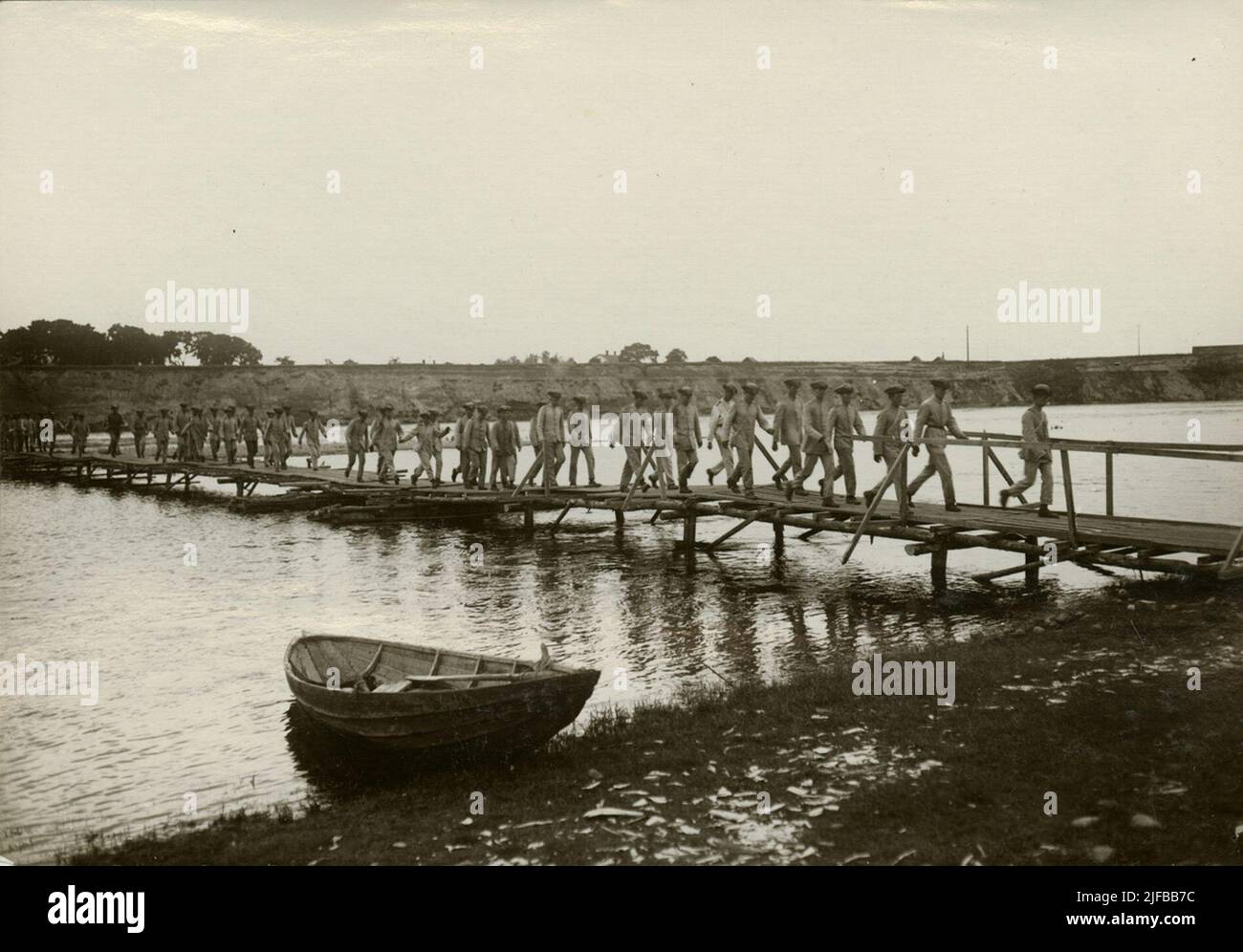 Students from the Karlberg war school go over a completed bridge Stock ...