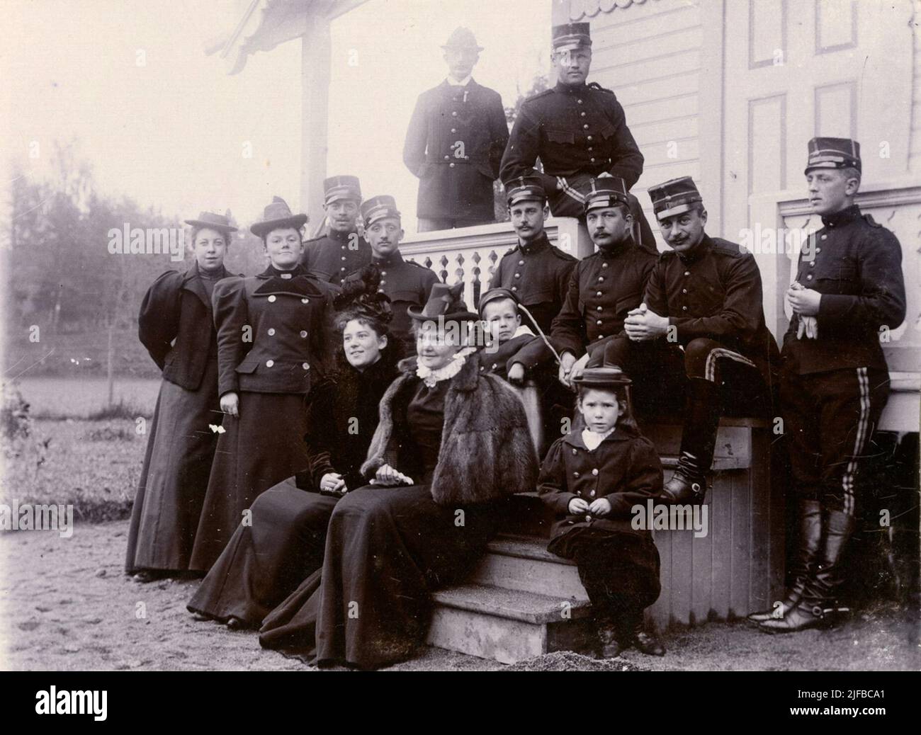 Group picture with soldiers and civilians in front of a building Stock ...