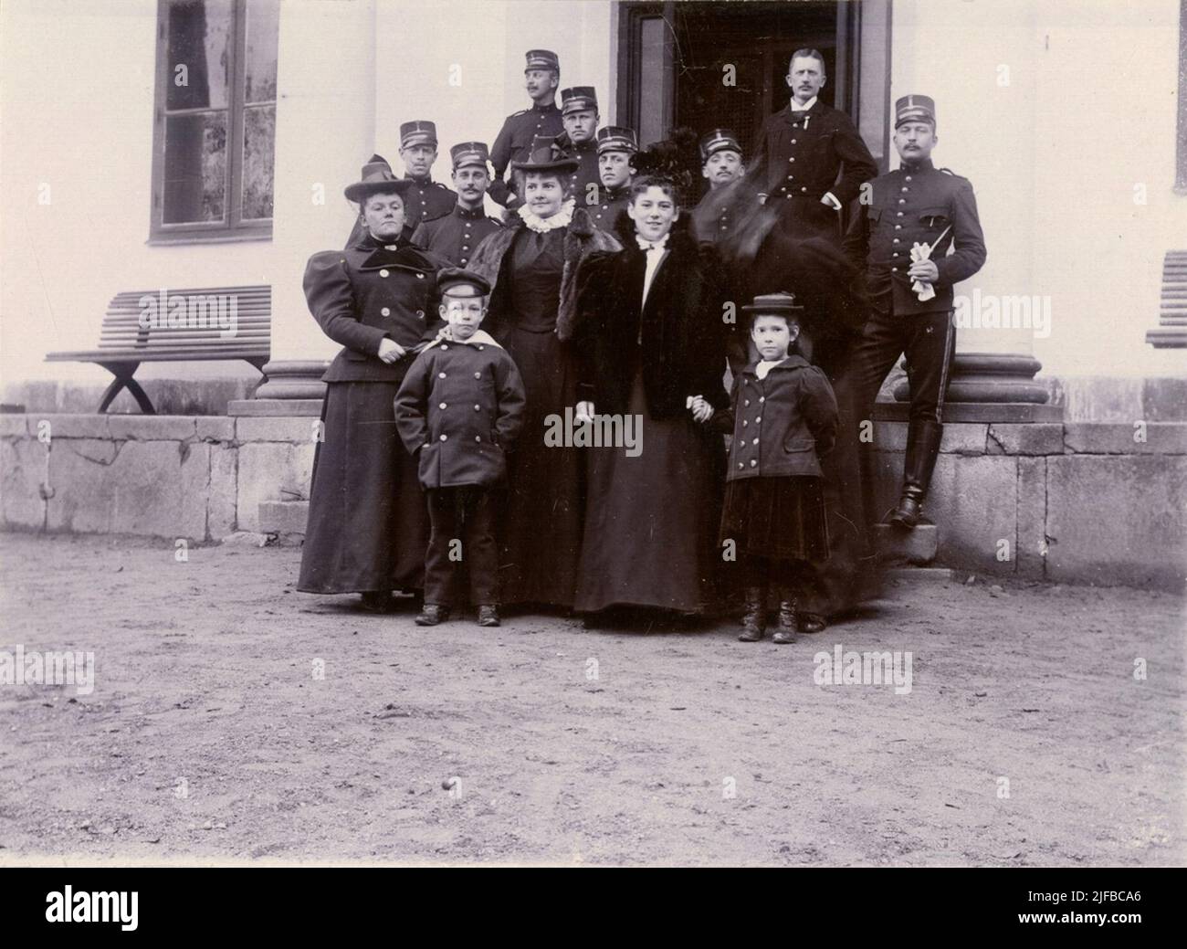 Group picture with soldiers and civilians in front of a building Stock ...