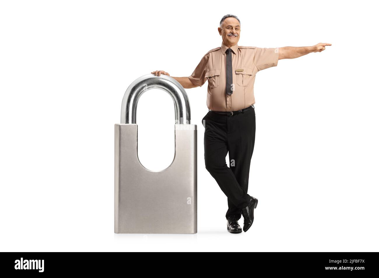 Security guard leaning on a padlock and pointing to the side isolated ...