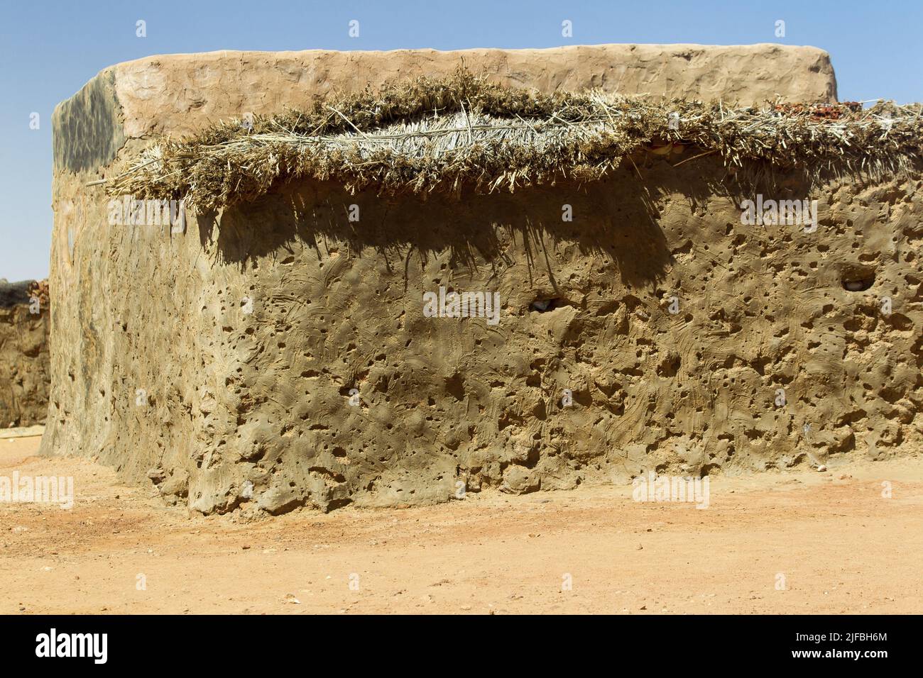 Chad, Ennedi, Wadi Hawar, Amdjarass, native village of Idriss Deby, mud ...