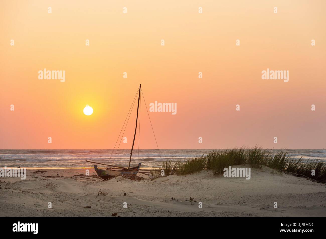 Madagascar, Menabe region, Morondava, fishing canoes on the beach Stock ...