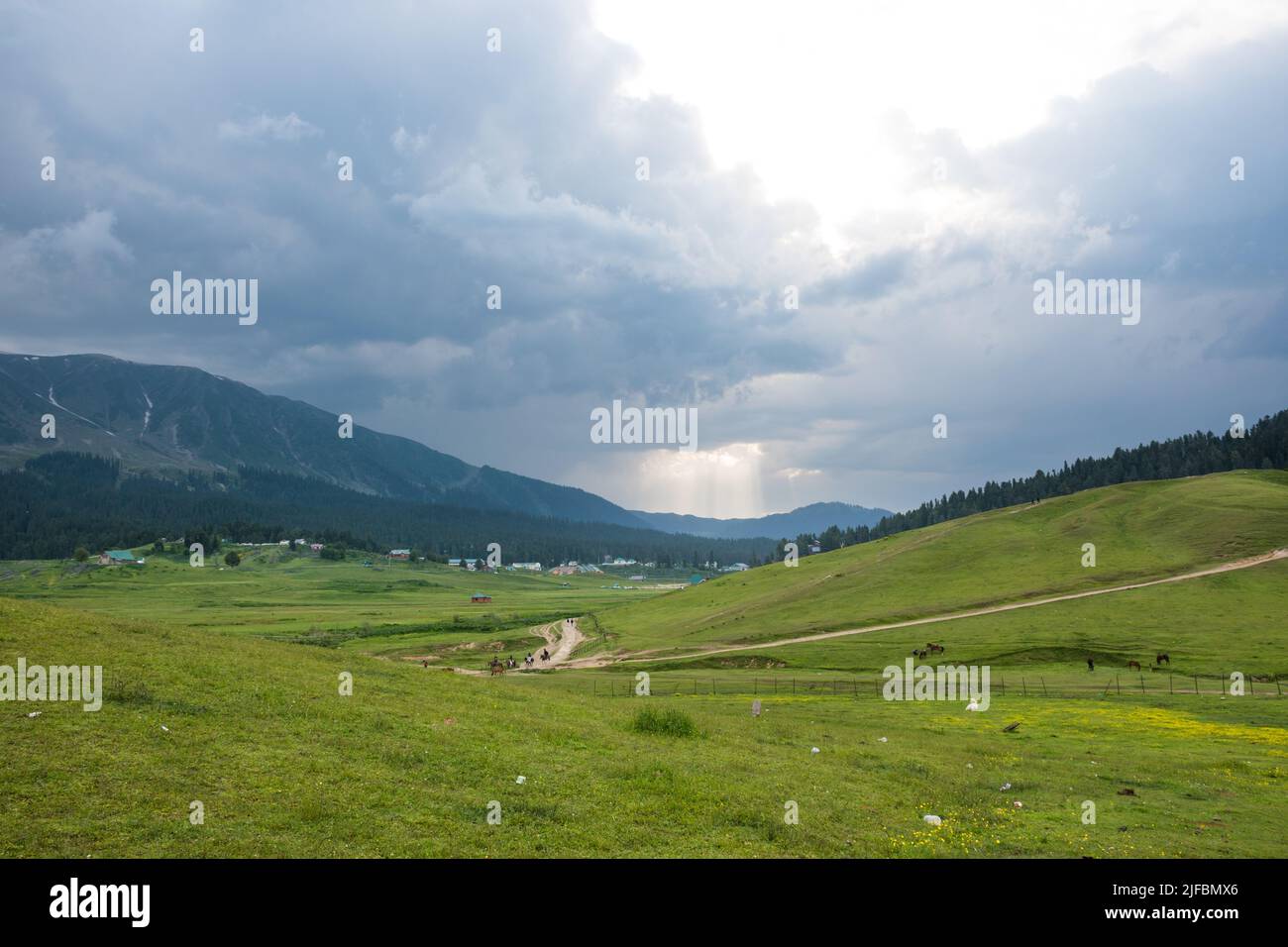 Beautiful view of Gulmarg Valley surrounded by snow frozen Himalayas ...