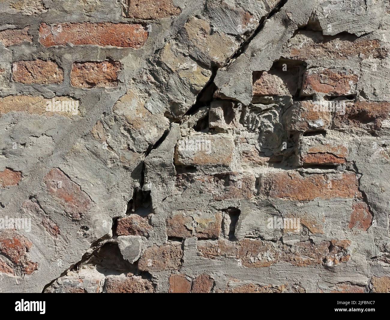 Crack line in the old damaged brick wall Stock Photo - Alamy