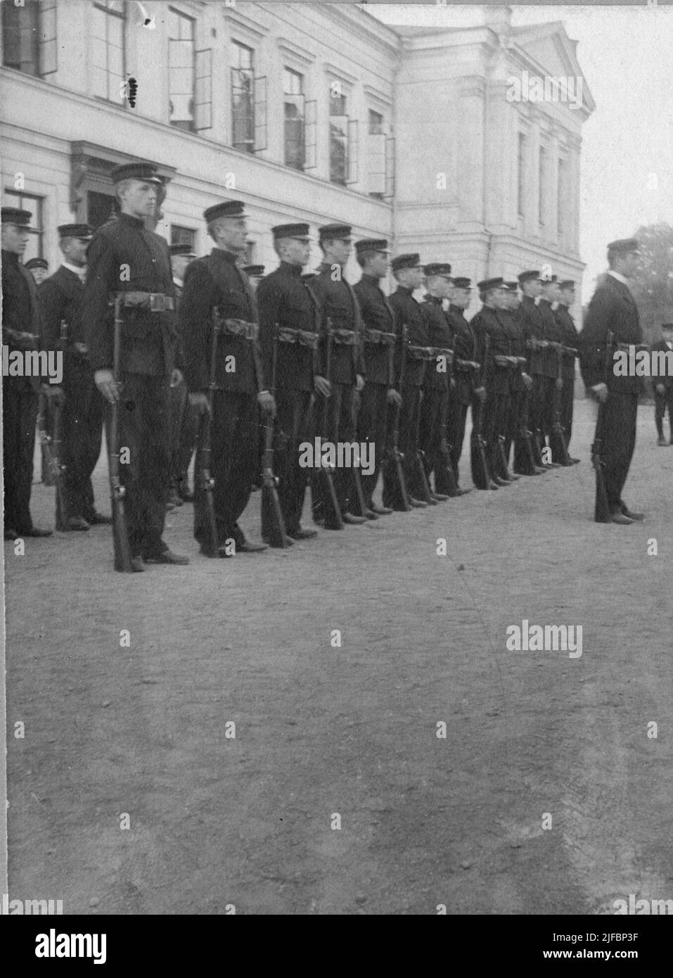Soldiers lined up outside regiment building Before military exercise in ...