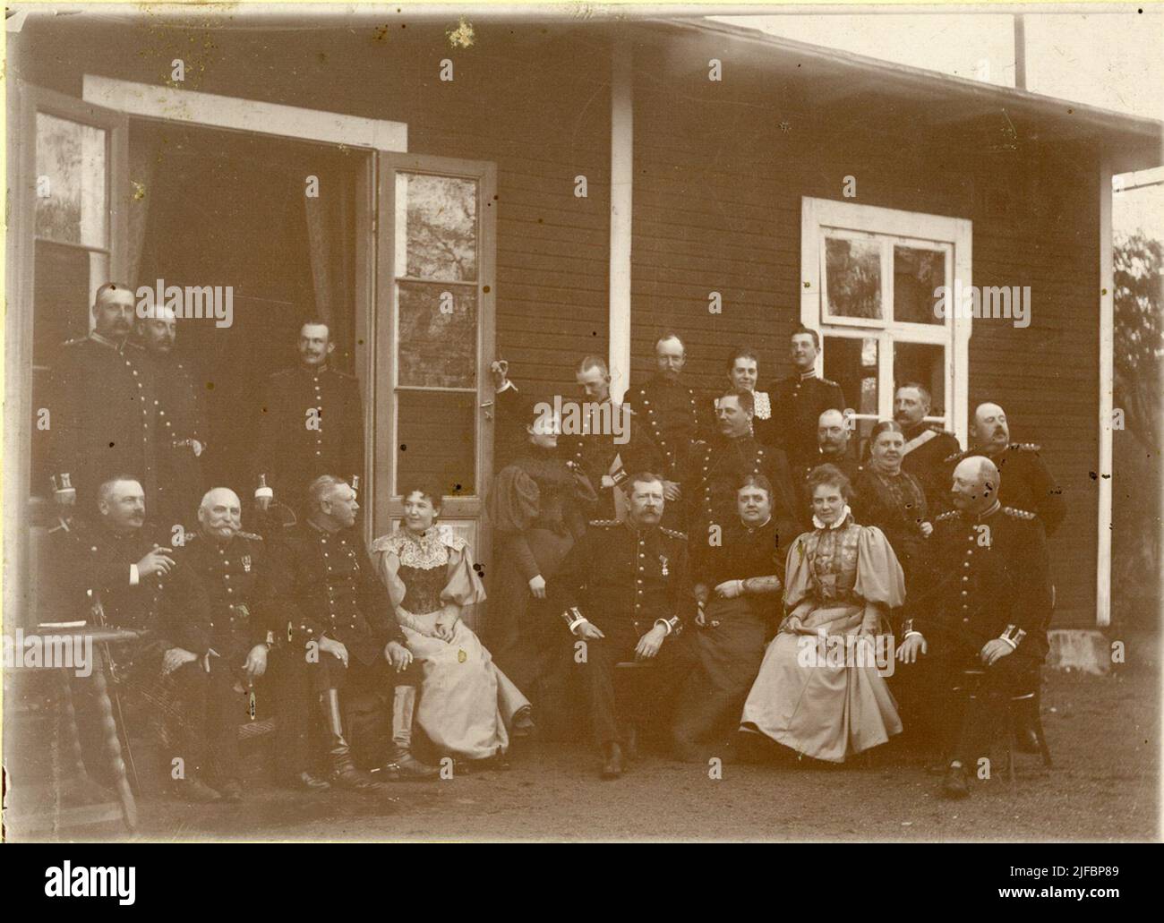 Group portrait of officers at Västmanland Regiment in 18 with women's ...