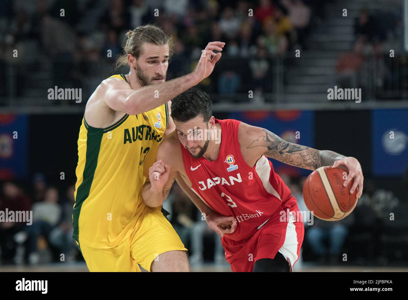 Melbourne, Australia. 01st July, 2022. Sam Froling (L) of Australia ...