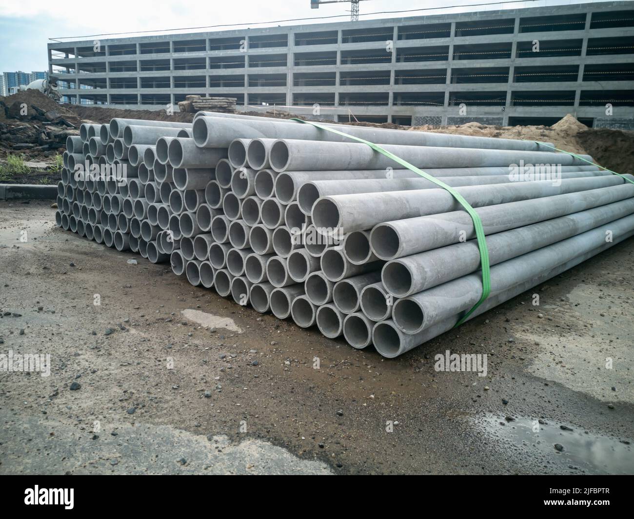 Reinforced concrete pipes at a construction site. Pipes at the ...