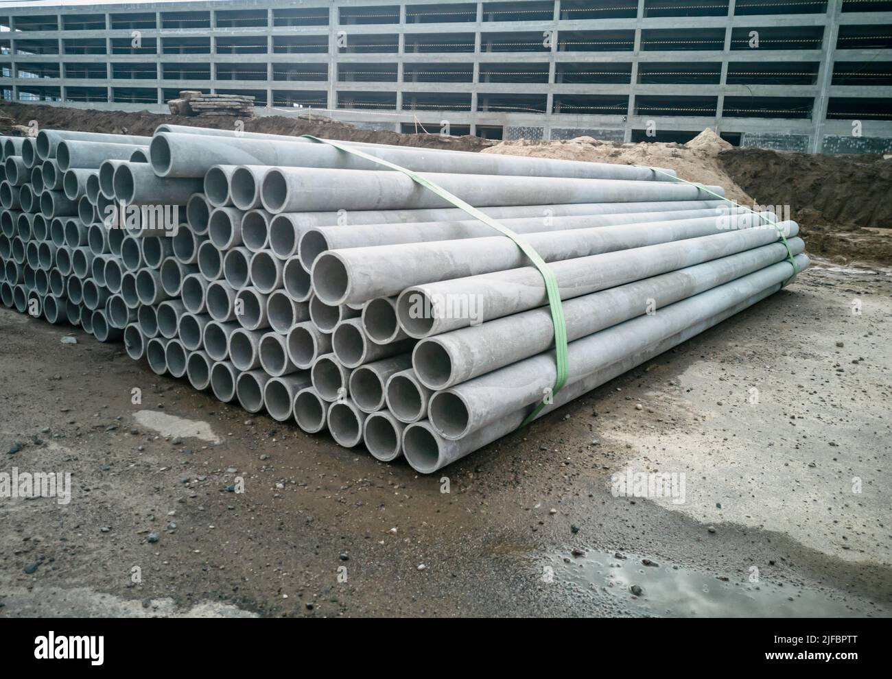 Reinforced concrete pipes at a construction site. Pipes at the ...