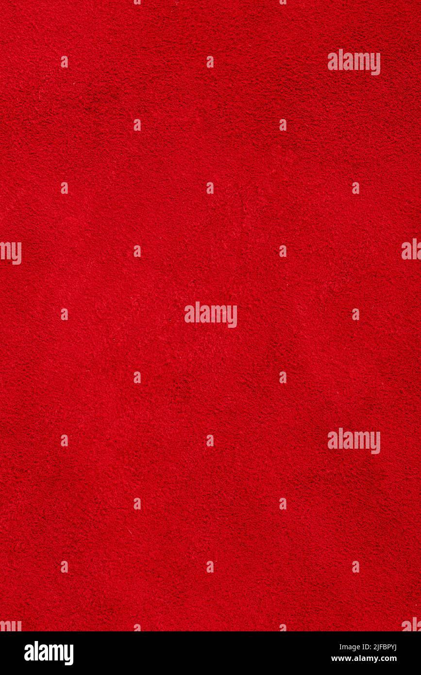 Red suede texture. Red matte background of suede. Velvet texture of ...