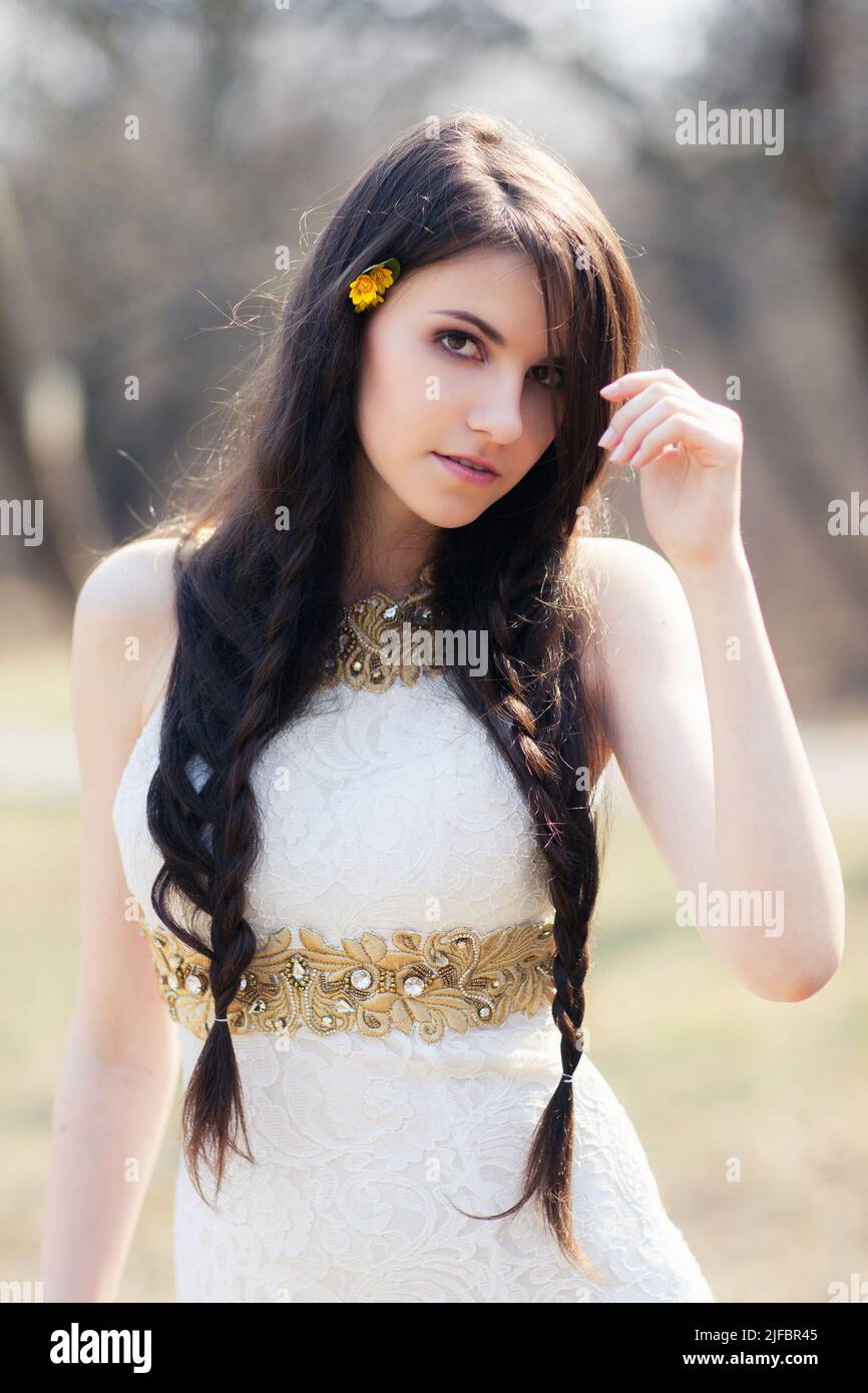 Braided bride in white dress at wedding photoshoot Stock Photo - Alamy
