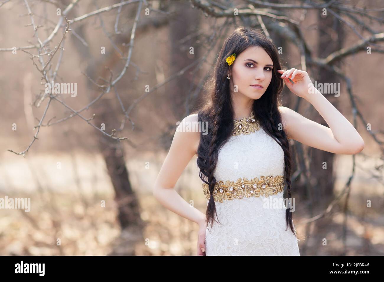 Braided bride at forest on wedding photoshoot Stock Photo - Alamy