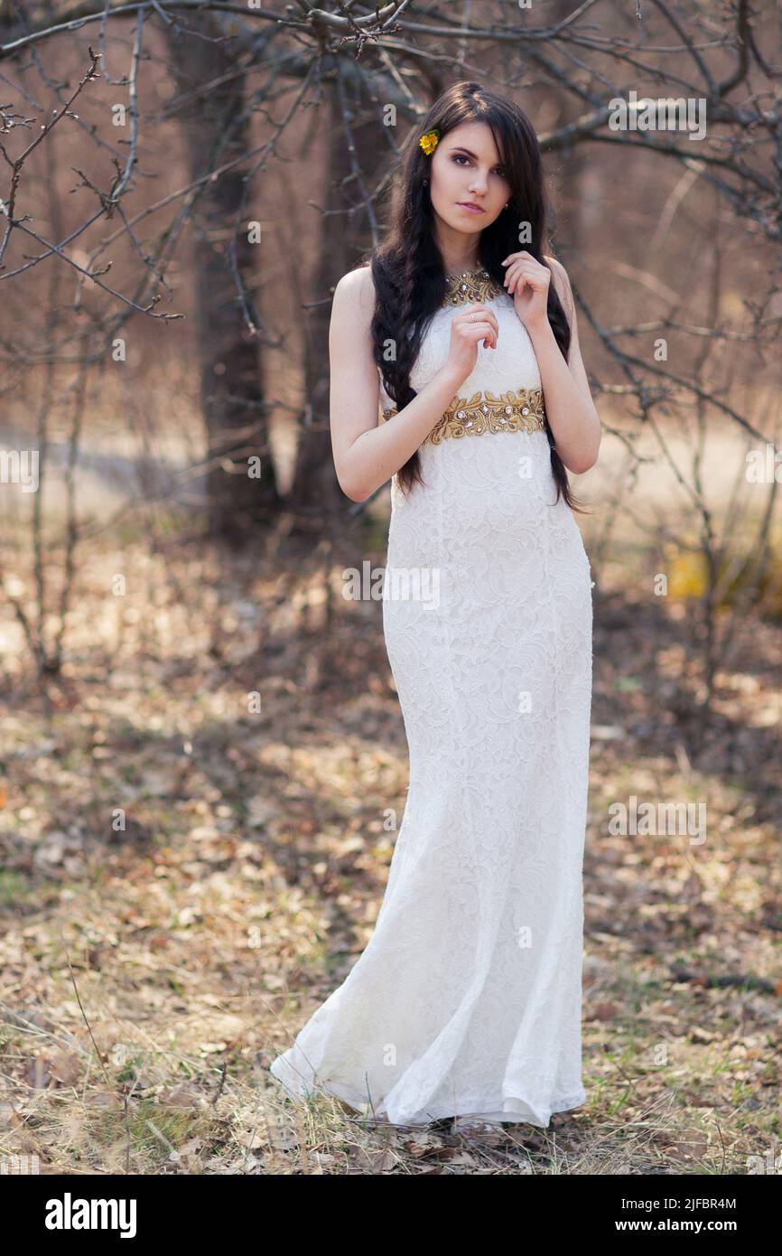 Braided bride at forest on wedding photoshoot Stock Photo - Alamy