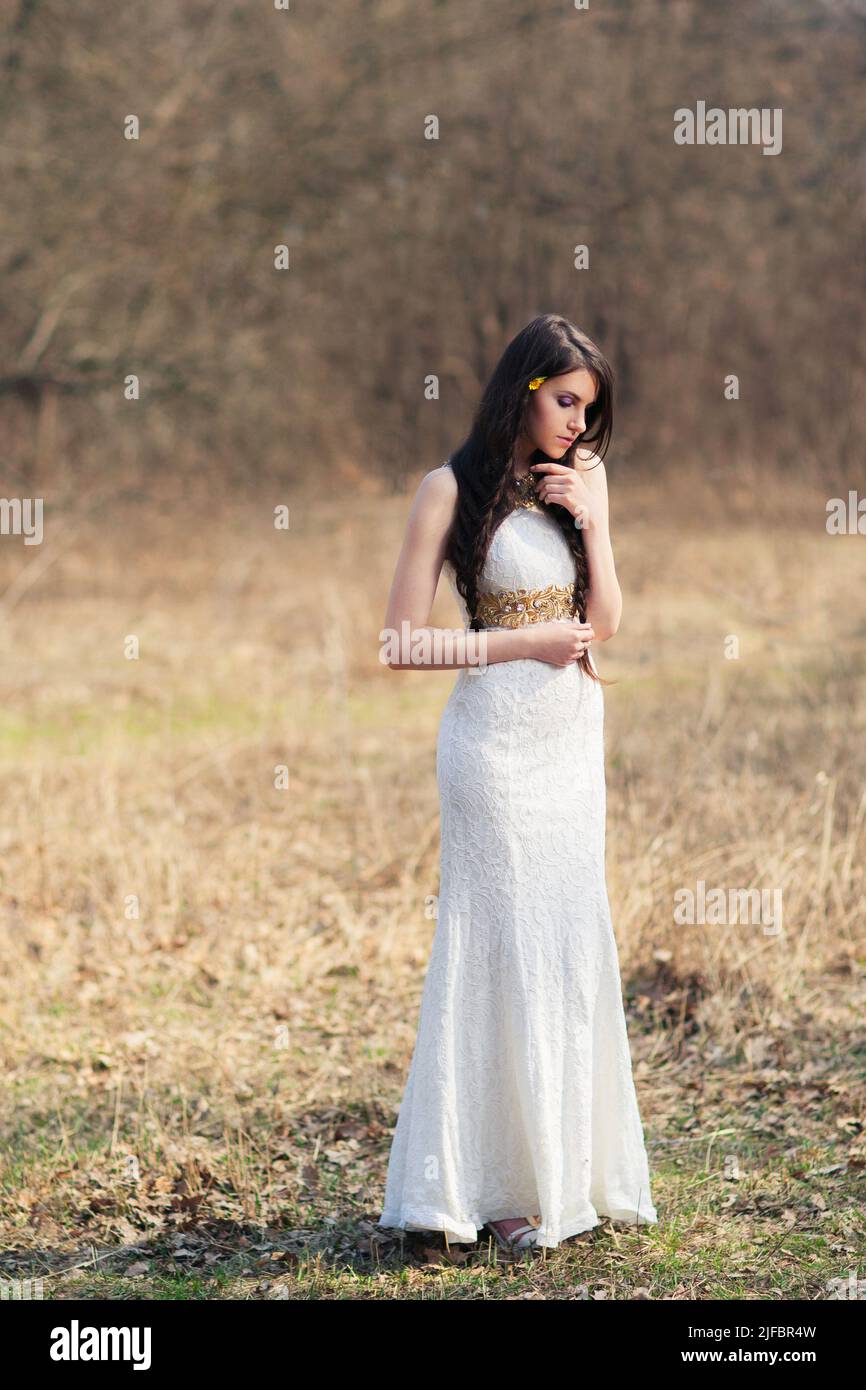 Braided bride in white dress at wedding photoshoot Stock Photo - Alamy