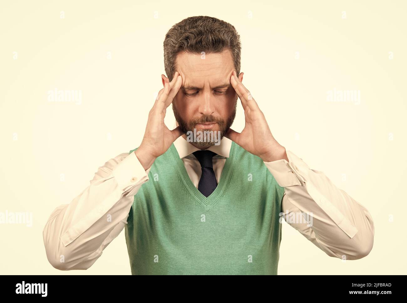 megraine. suffering businessman isolated on white. stressed guy having ...