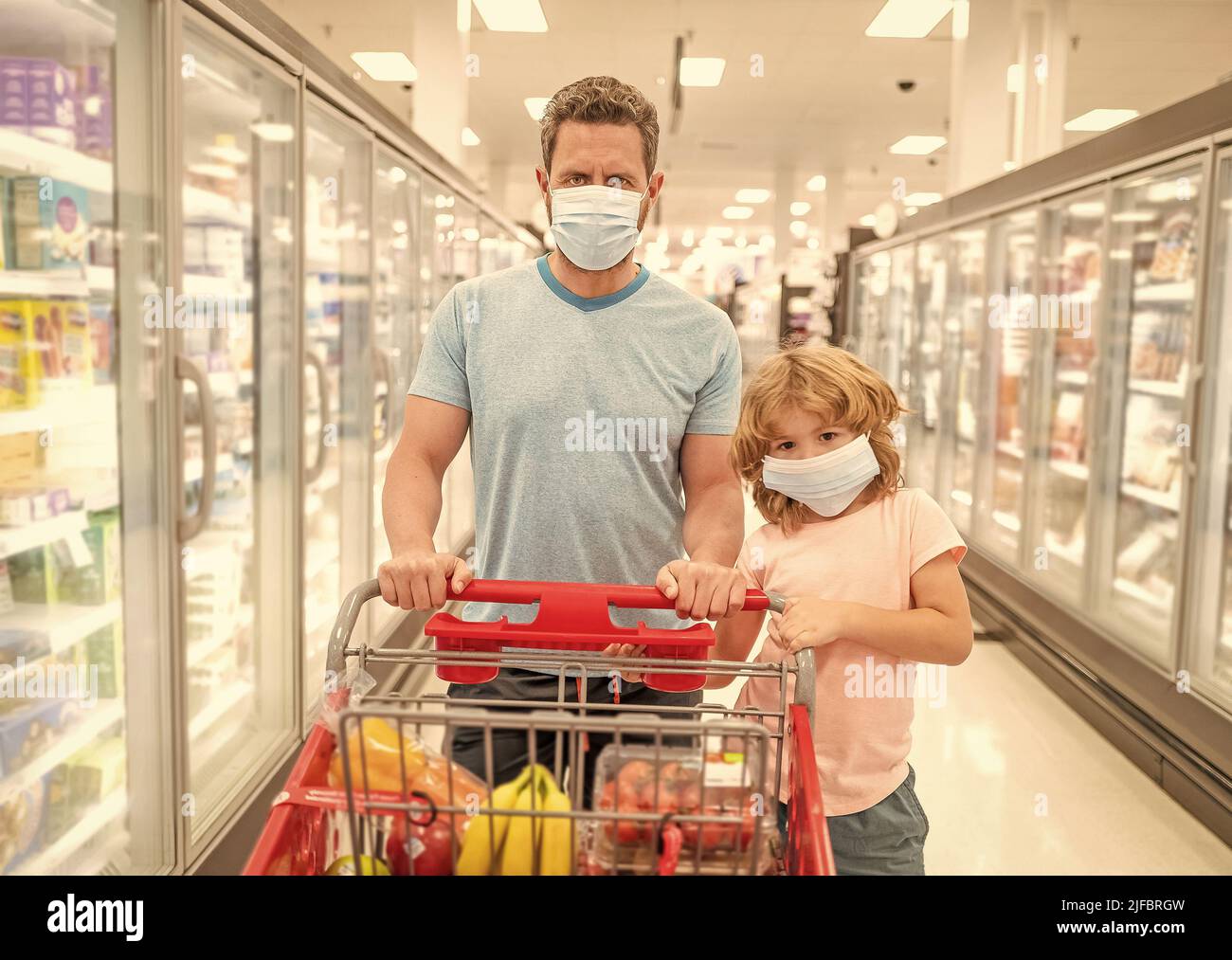 customer consumer with purchases. dad and kid at grocery store Stock ...