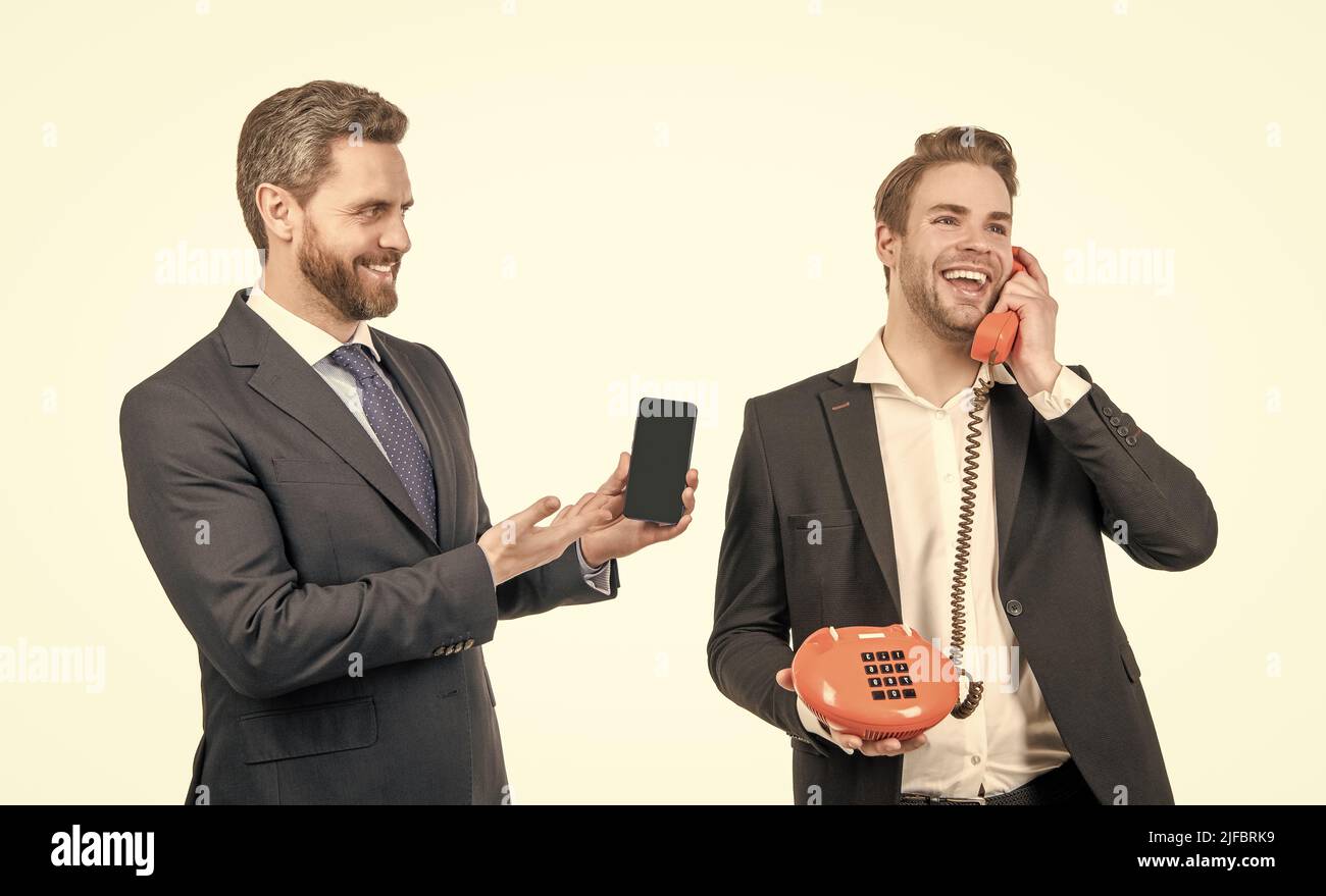 Try this. Businessmen use mobile phone and telephone. Modern ...